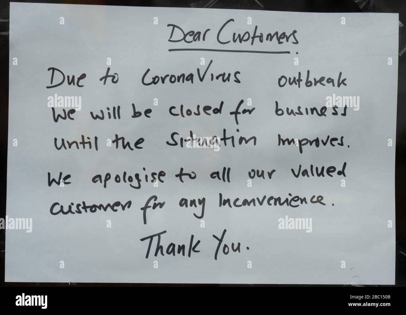 Closed poster on shop window during Coronavirus pandemic, April 2nd ...