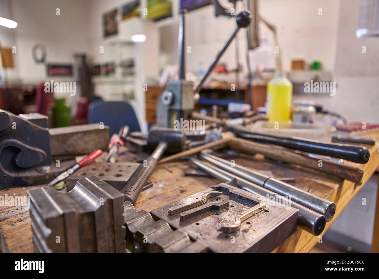 Goldsmith, different kind of tools on workbench Stock Photo - Alamy
