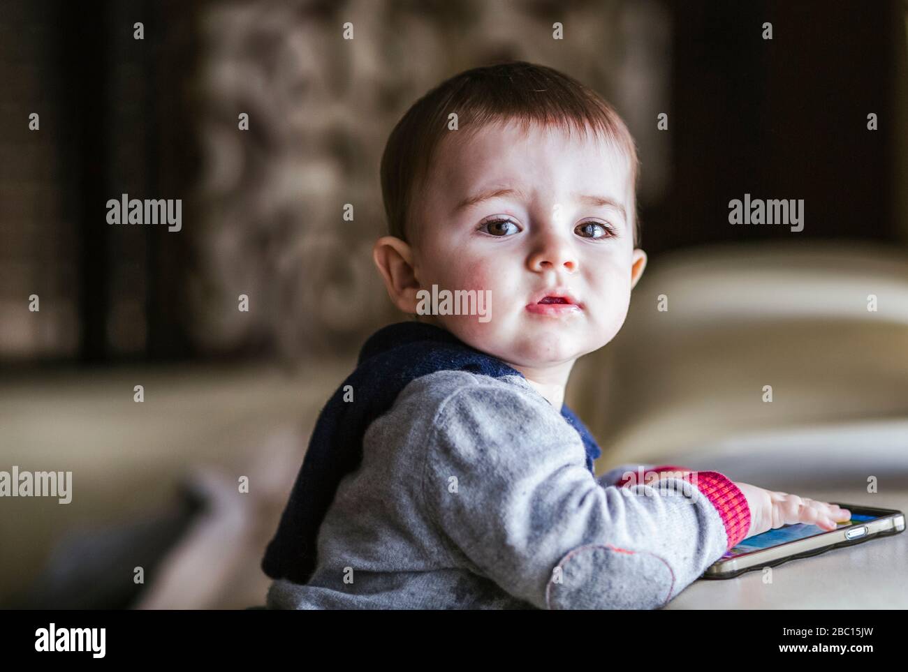 Baby smartphone hi-res stock photography and images - Alamy