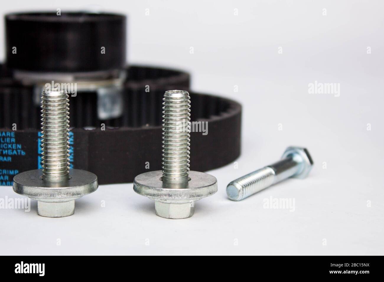 Repair kit: gear belt and bolts isolated on a white background Stock ...