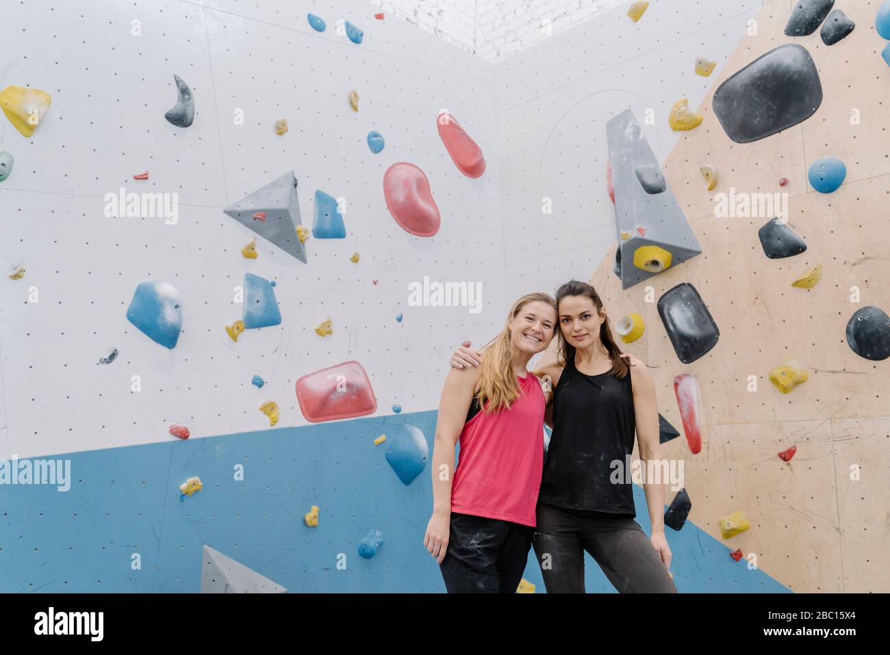 Two women climbing hi-res stock photography and images - Alamy