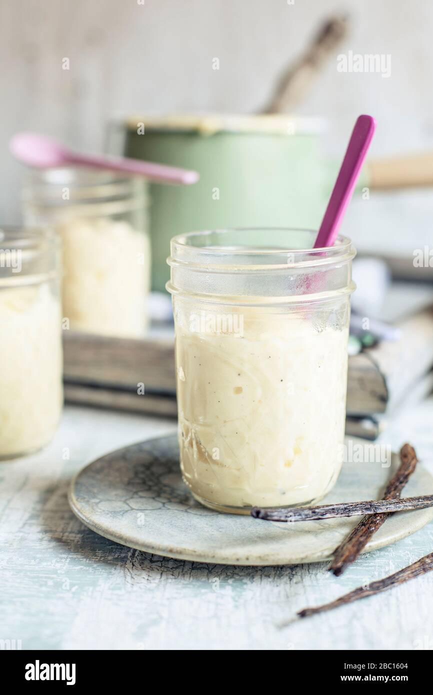 Jar of homemade vanilla custard Stock Photo - Alamy
