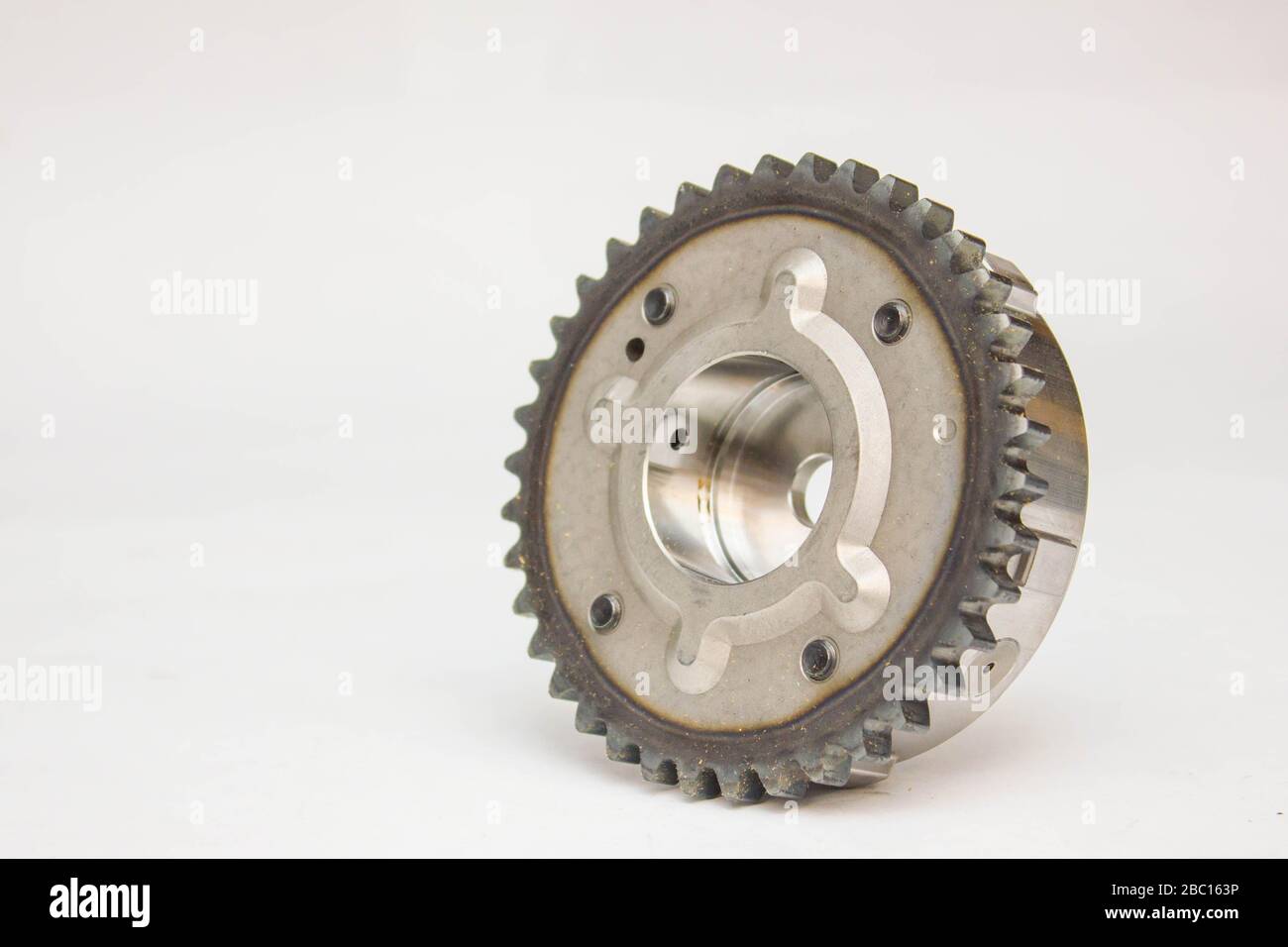 New details on a gray background. The camshaft gears Stock Photo - Alamy