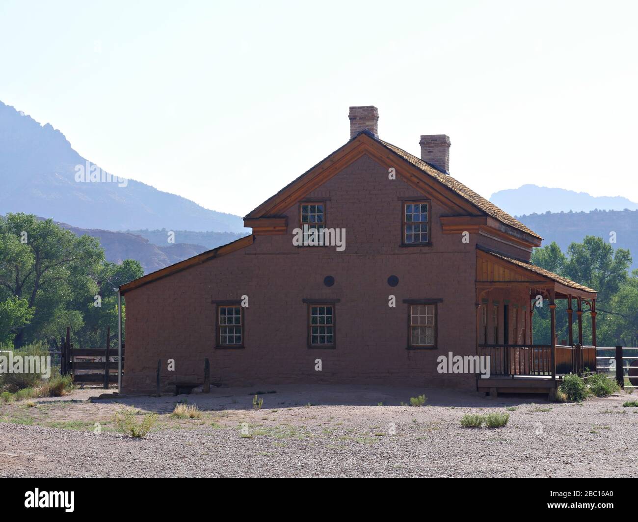 Rustic adobe building of the Russell Home, built in 1862 and is one of ...