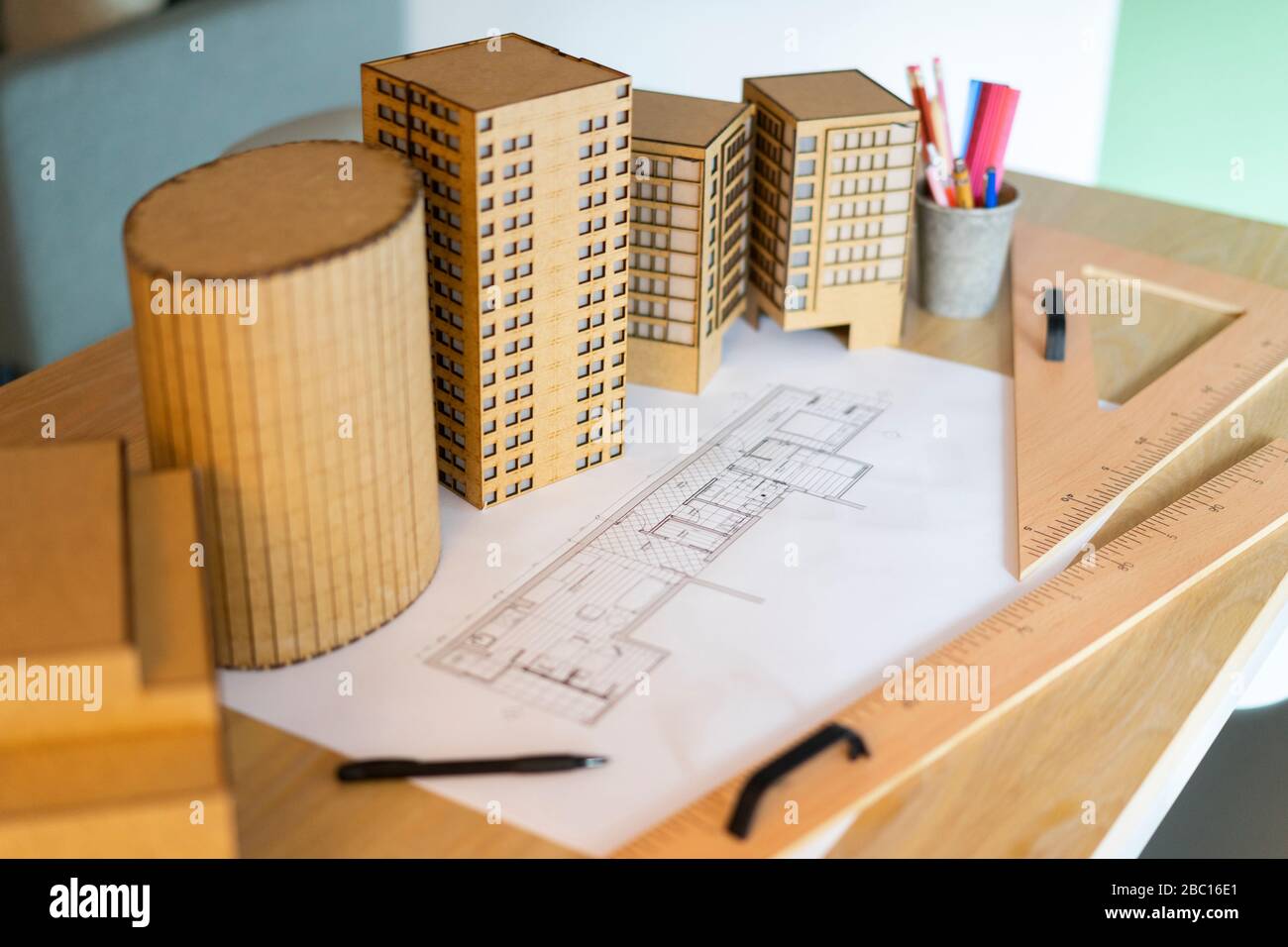 Architectural model and plan on table Stock Photo - Alamy