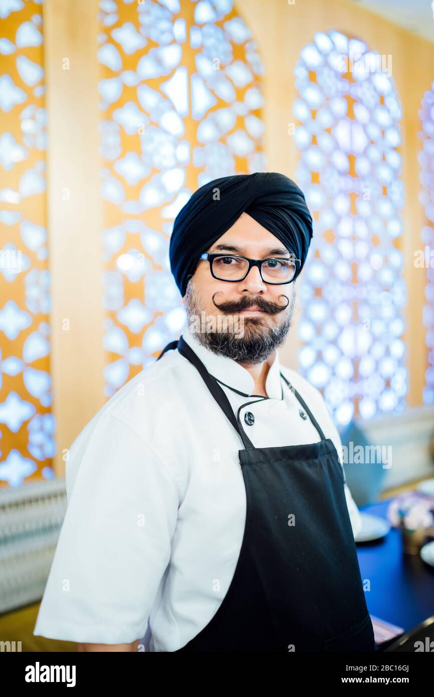 Portrait of Indian chef in restaurant Stock Photo - Alamy