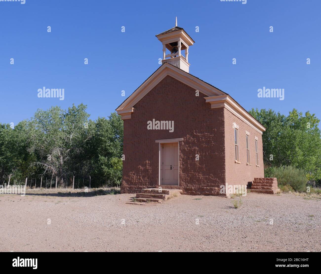 Front view of the historic rustic, adobe schoolhouse building at the ...