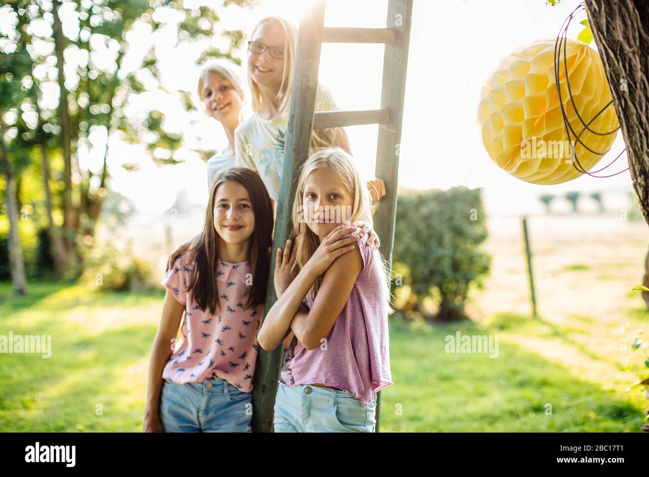 Portrait of girls on a birthday party outdoors Stock Photo - Alamy