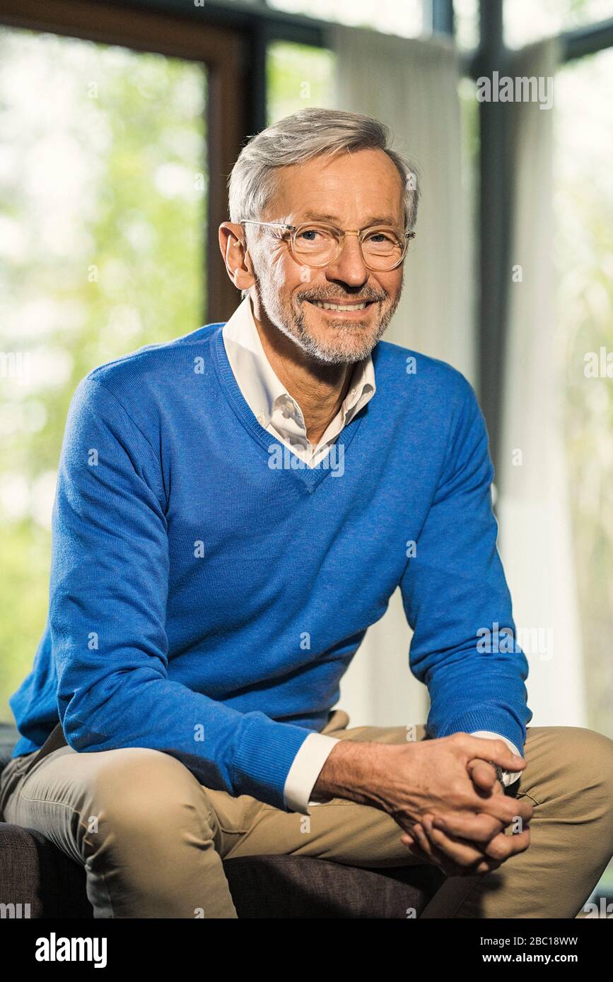 Portrait smiling senior man home hi-res stock photography and images ...