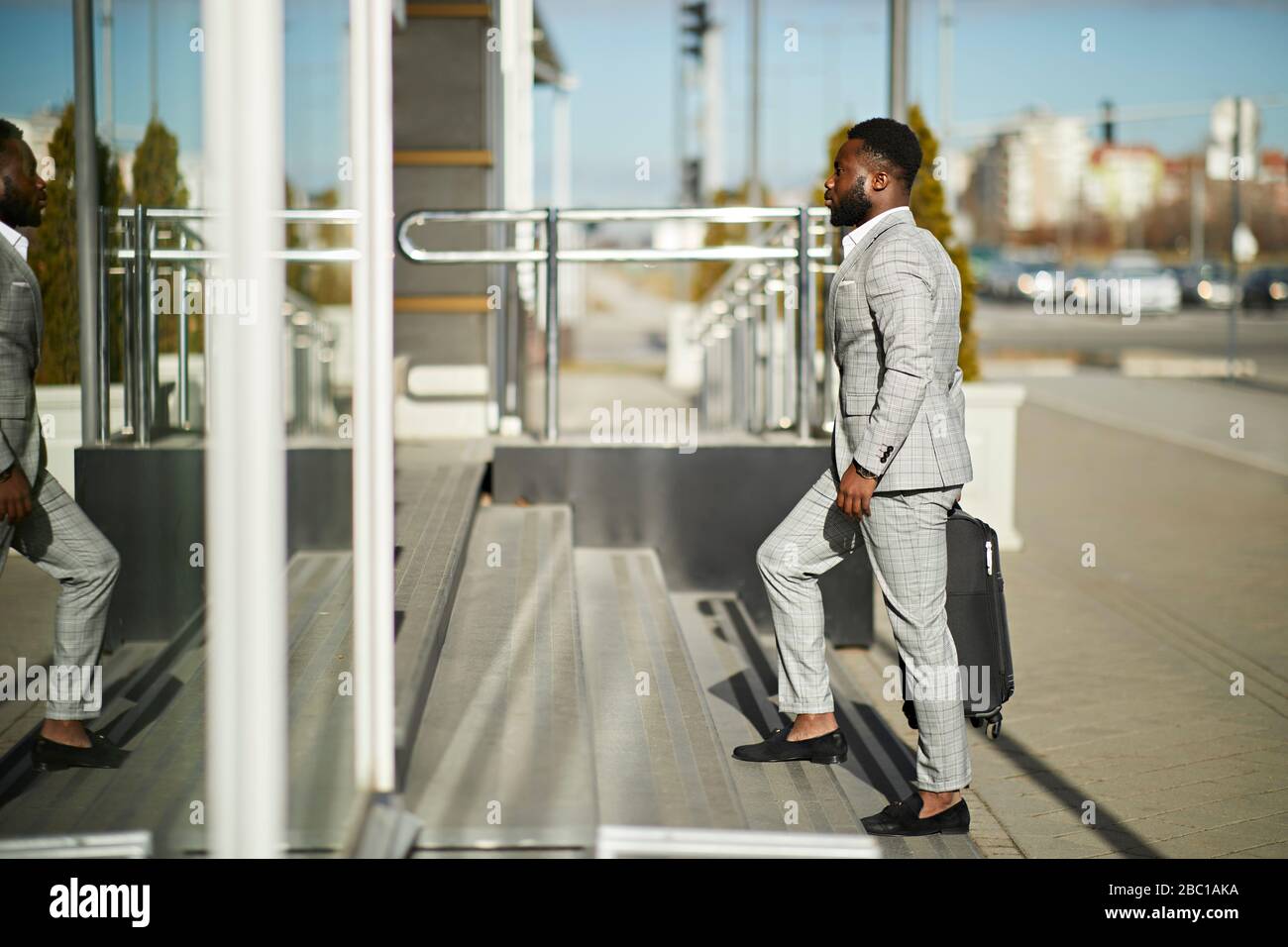 Steps man entering hi-res stock photography and images - Alamy