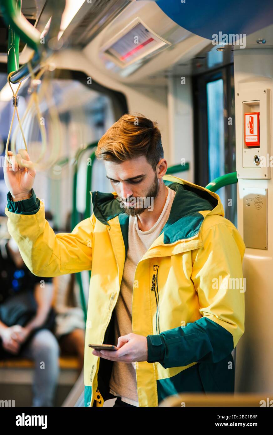Reading on subway hi-res stock photography and images - Alamy
