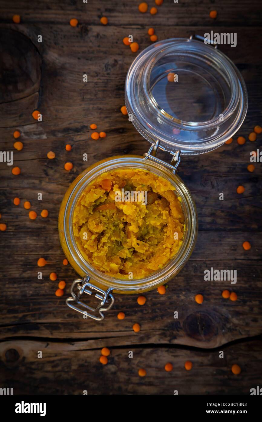 Jar of homemade red lentil paste Stock Photo - Alamy