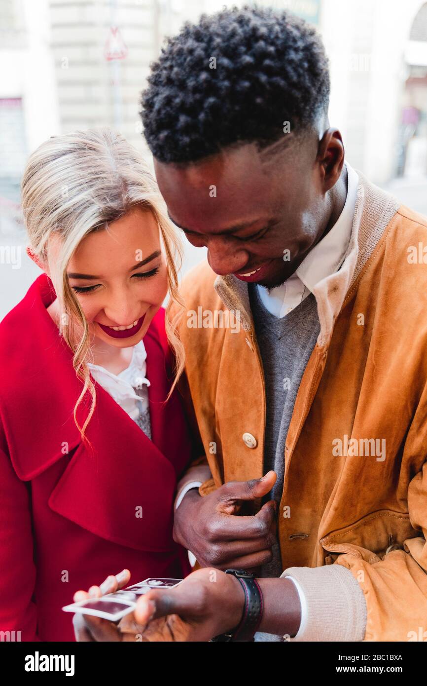 Sharing coat hi-res stock photography and images - Alamy