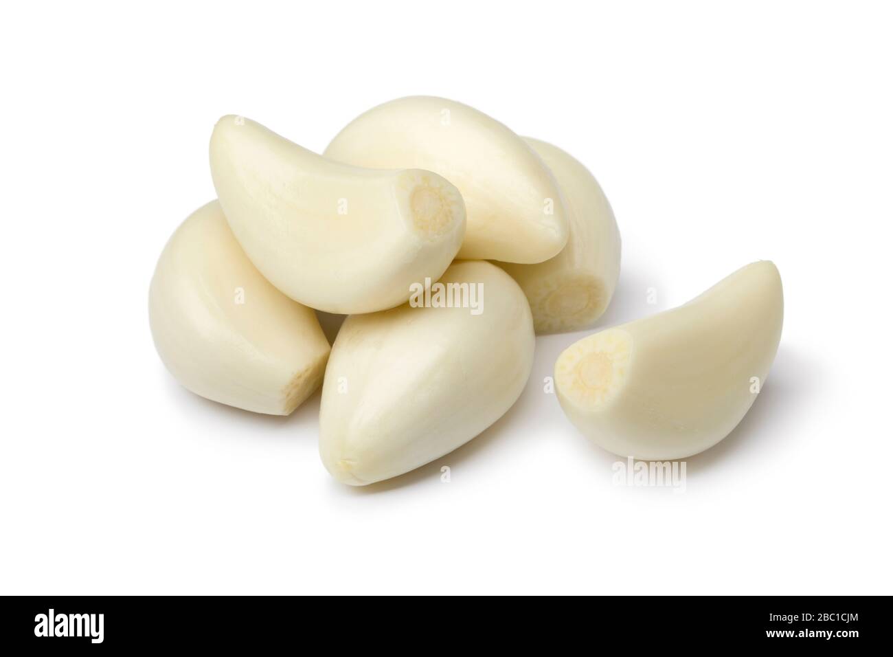 Fresh whole peeled garlic cloves isolated on white background Stock ...