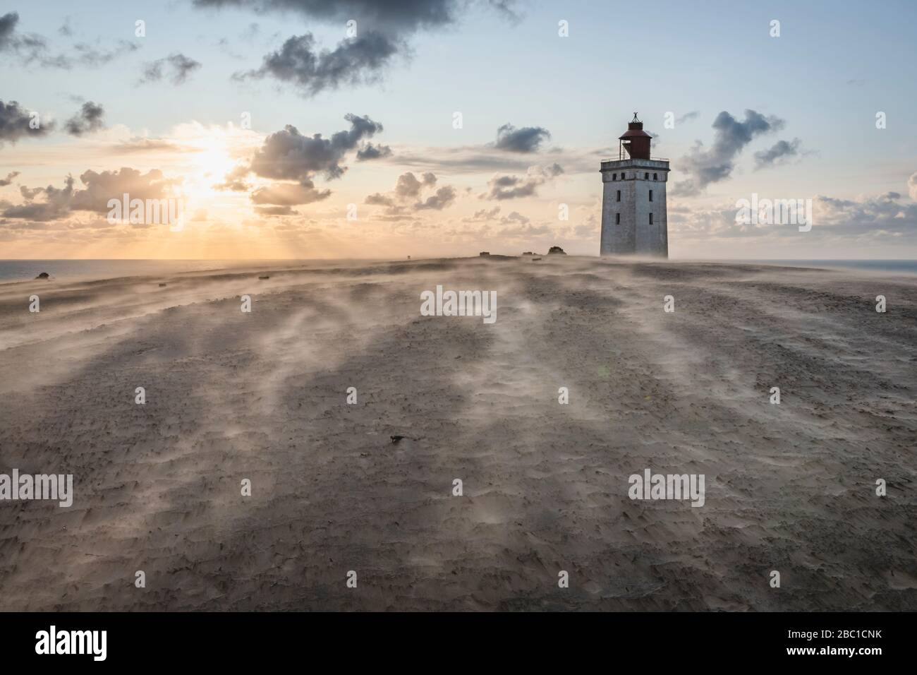 Denmark, Lonstrup, Rubjerg Knude Lighthouse at sunset Stock Photo - Alamy