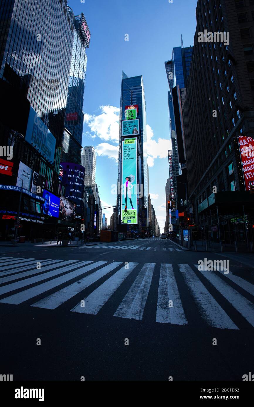 Empty times square, main billboard electronic signage, covid19 warnings ...
