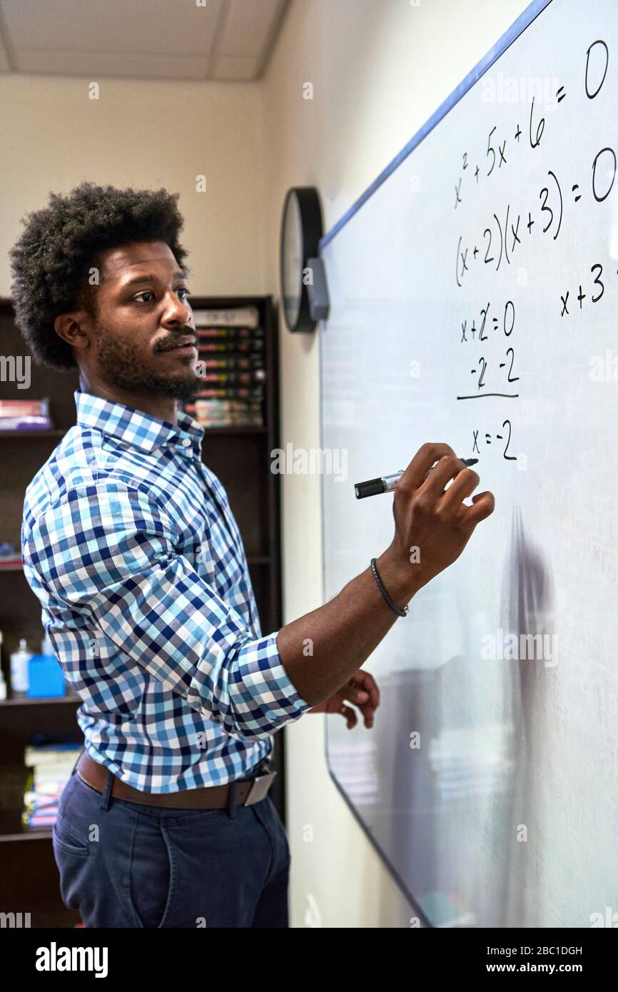 Maths teacher hi-res stock photography and images - Alamy