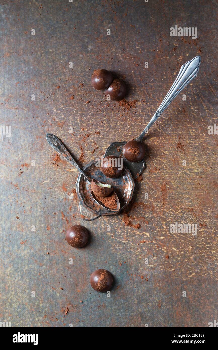 Chocolate pralines with vanilla filling Stock Photo - Alamy