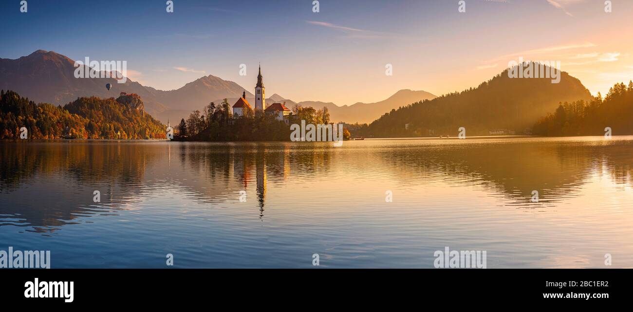 Slovenia, Bled, Panorama of Lake Bled at sunrise Stock Photo - Alamy