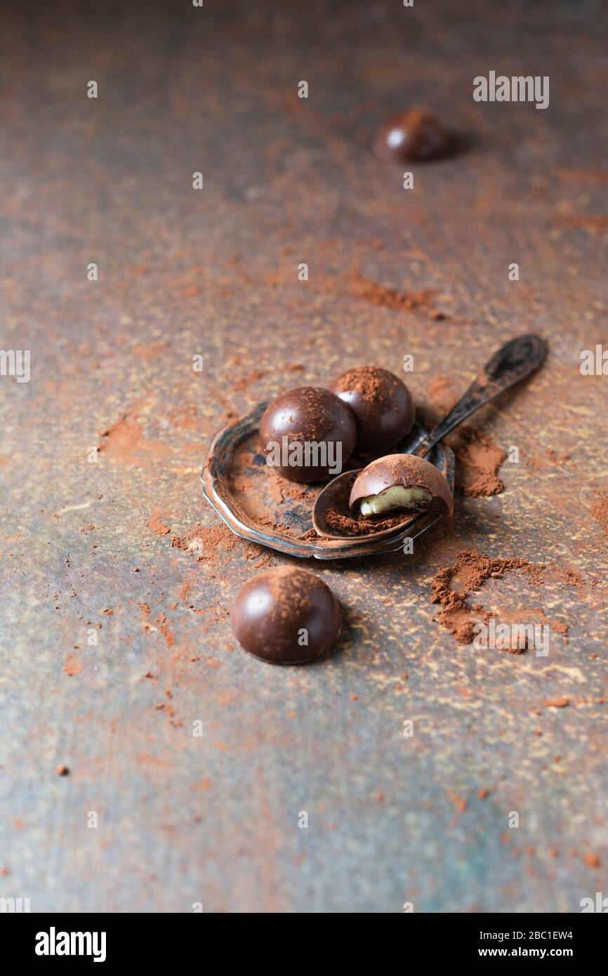 Chocolate pralines with vanilla filling Stock Photo - Alamy