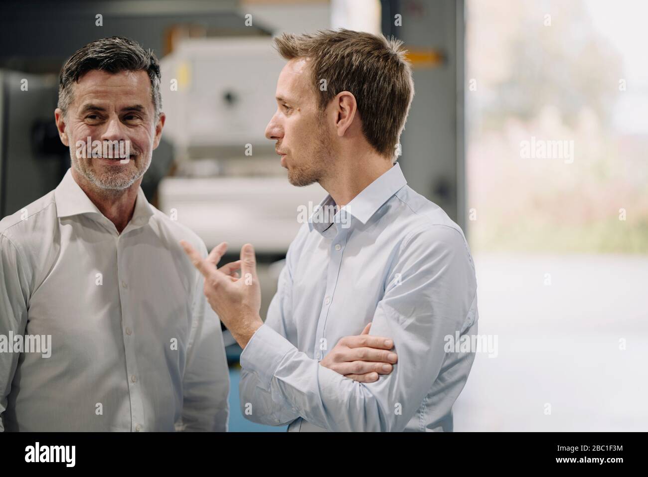 Two business people talking close up hi-res stock photography and ...