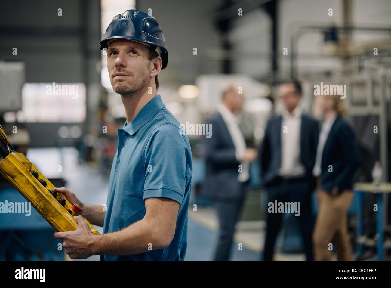 Industrial worker operating machine hi-res stock photography and images ...
