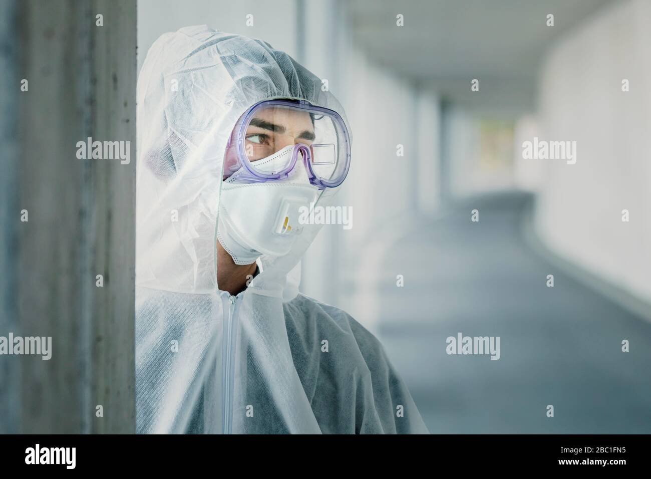 Portrait of man wearing protective clothing Stock Photo - Alamy