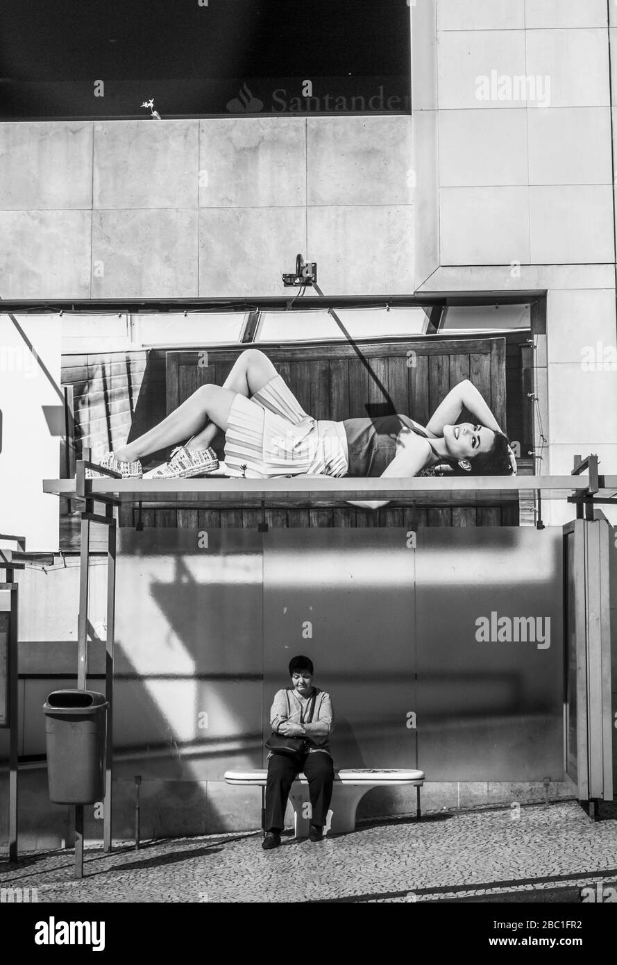 Bus bench advertising Black and White Stock Photos & Images - Alamy