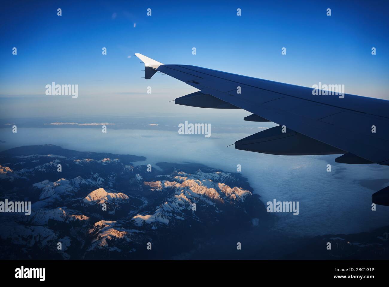 France, Auvergne-Rhone-Alpes, Wing of Airbus A321 flying over European ...
