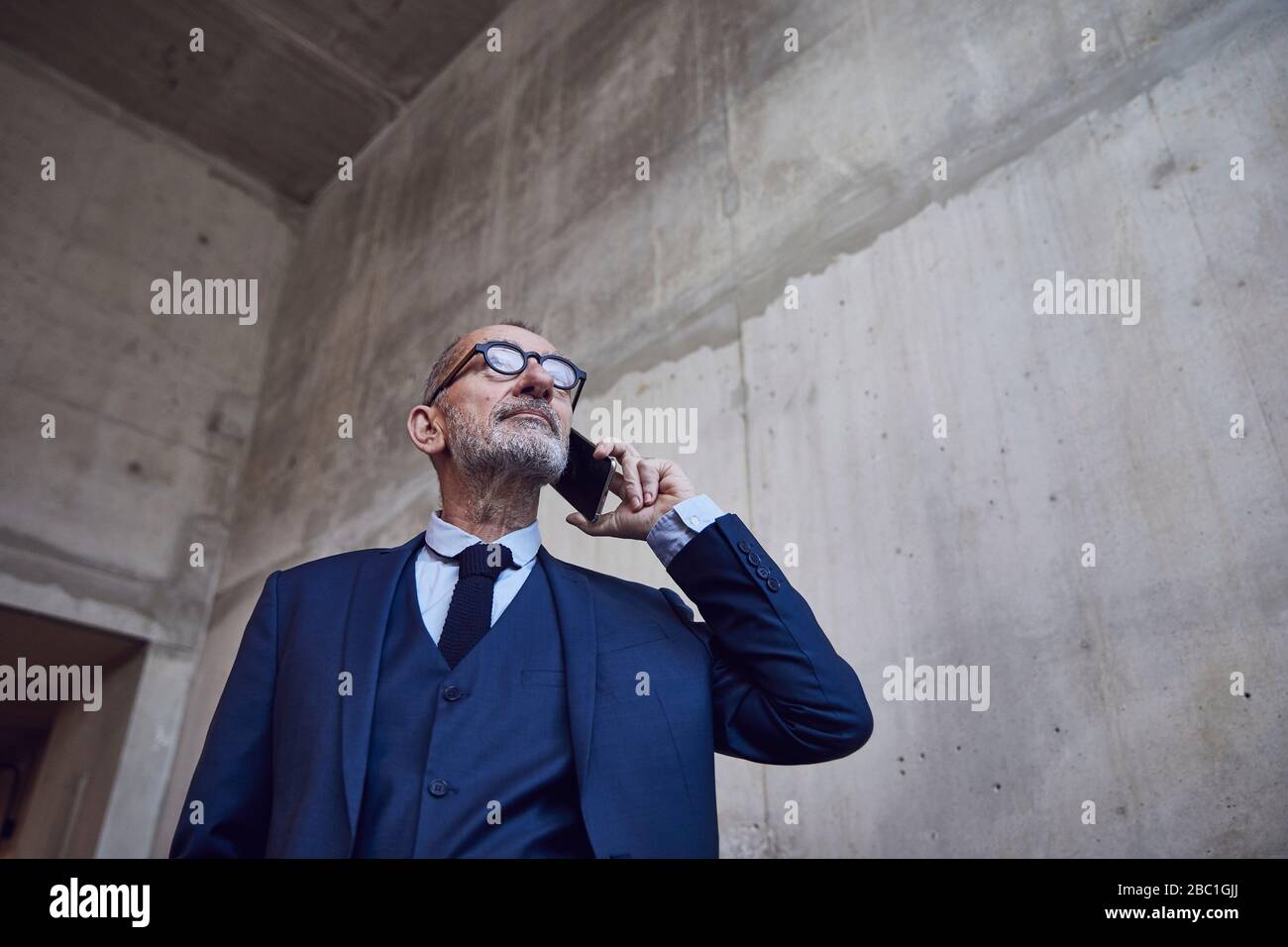 Low angle talking men hi-res stock photography and images - Alamy