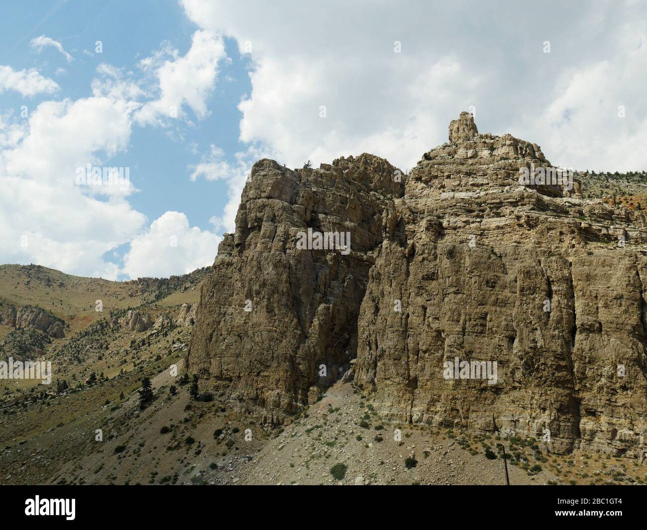 Spectacular buttes and geologic formations seen along the road from ...