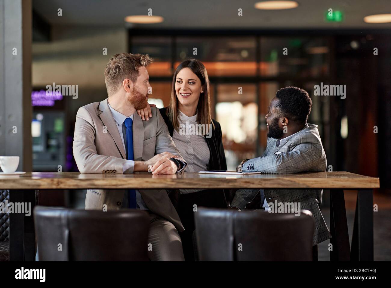 Business people meeting in hotel lobby Stock Photo - Alamy