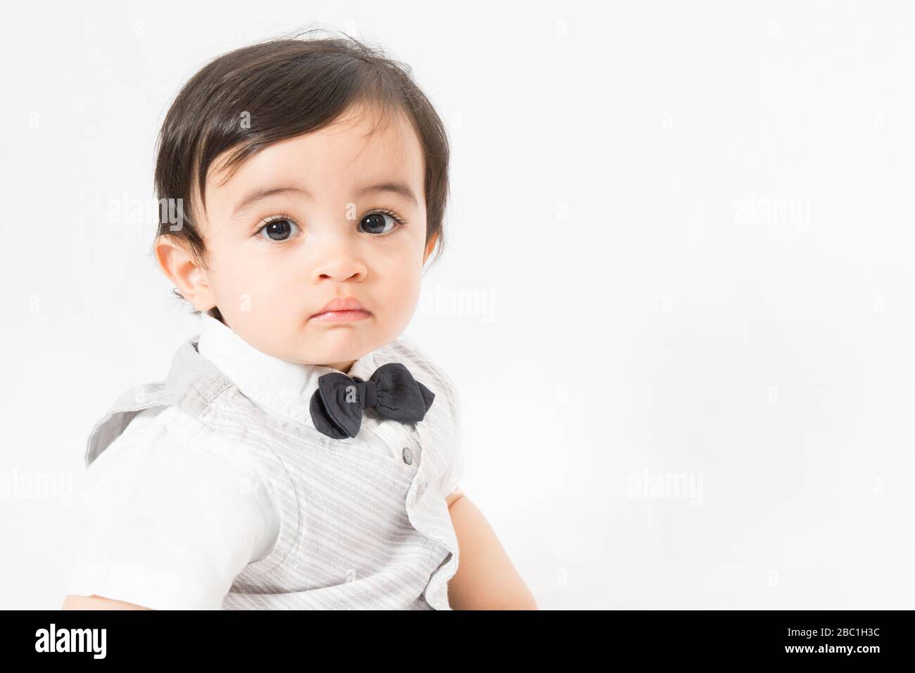 portrait of smart and handsome boy on nice isolated white background ...