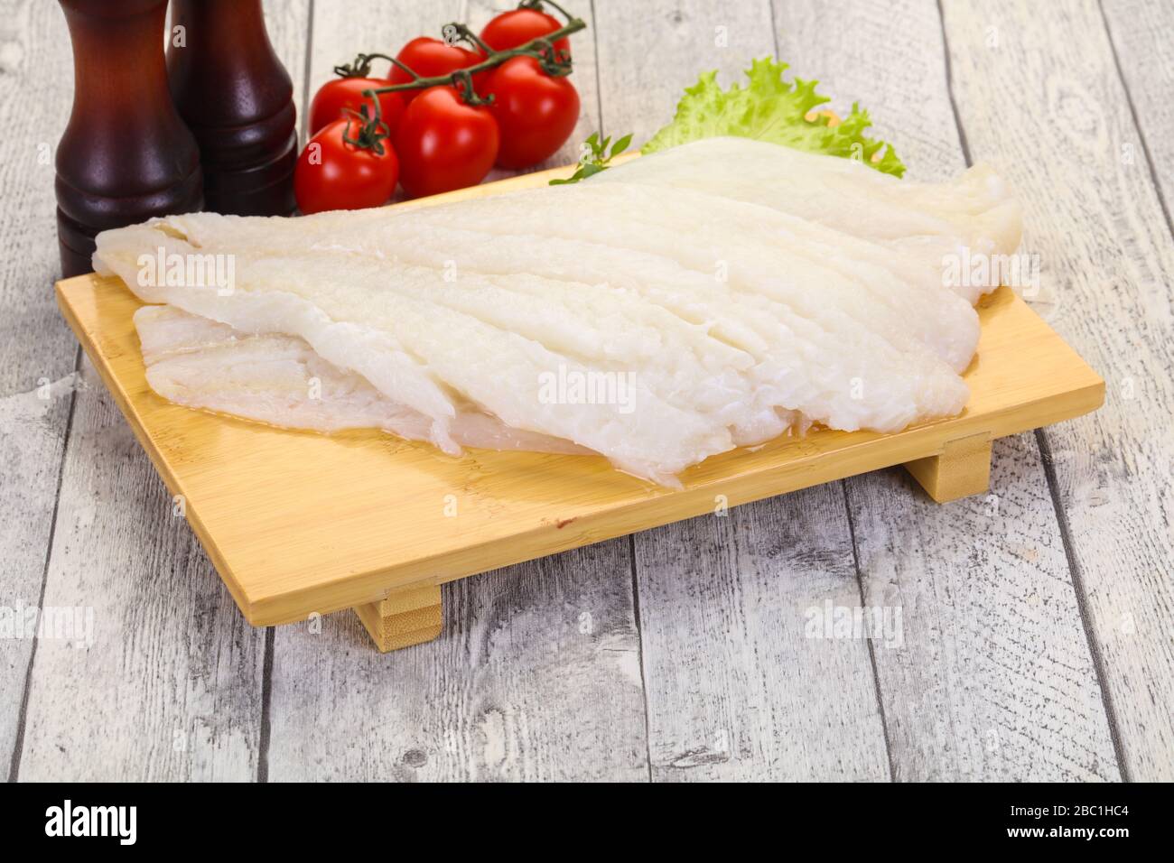 Raw halibut fillet ready for cooking Stock Photo - Alamy
