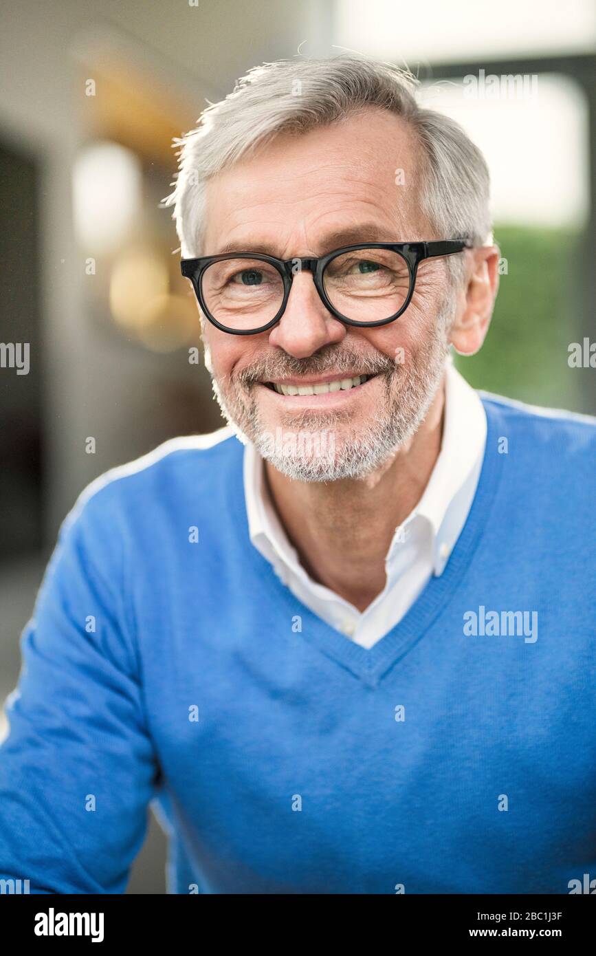 Portrait smiling senior man home hi-res stock photography and images ...