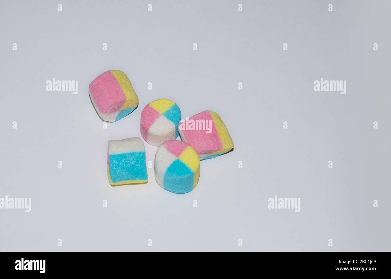 Colorful cylinder shape sweet candies isolated on white background ...