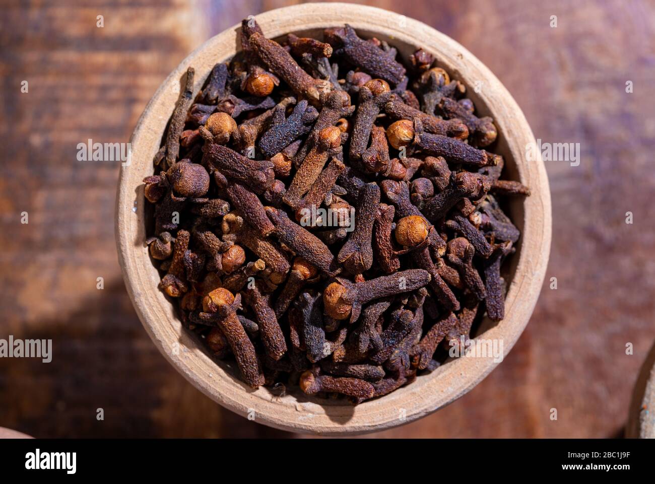 Indian spices collection, dried aromatic cloves flower buds and another ...