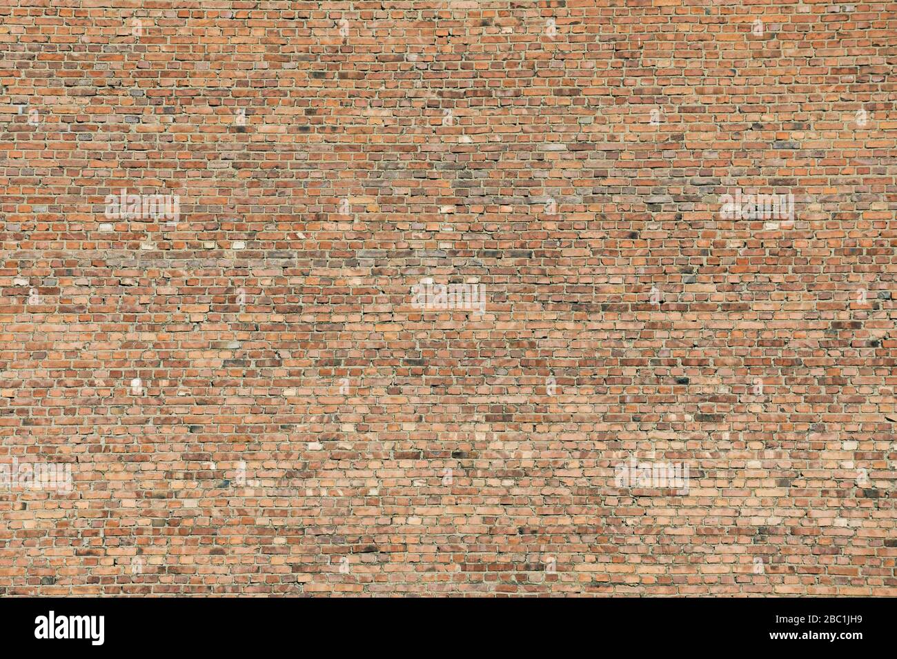Old messy brick wall texture background exterior Stock Photo - Alamy
