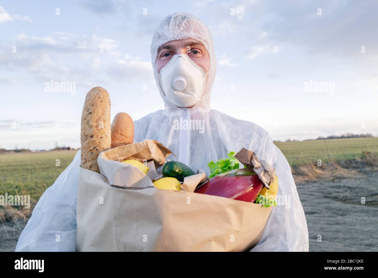 Man holding groceries hi-res stock photography and images - Alamy