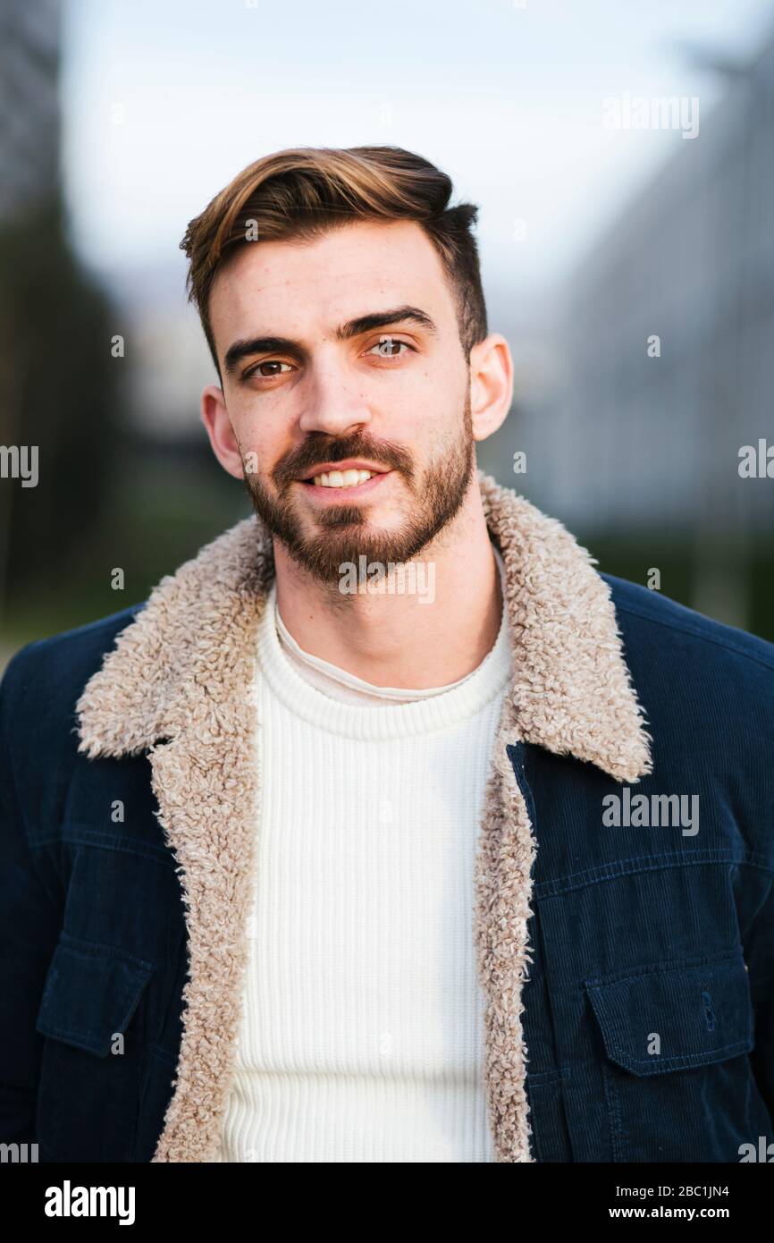 Portrait of smiling man outdoors Stock Photo - Alamy