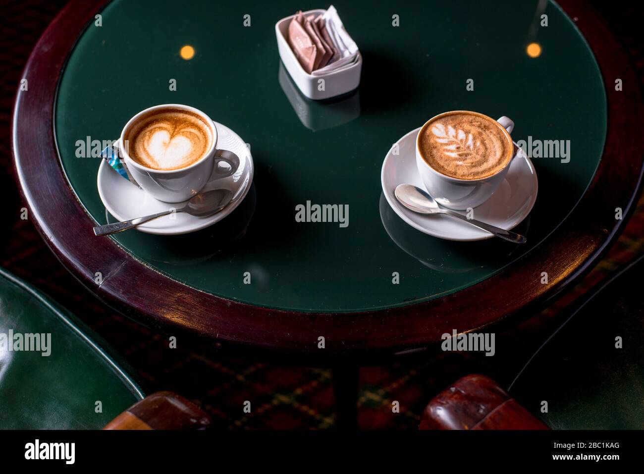 Cups of coffee served on the restaurant table Stock Photo - Alamy