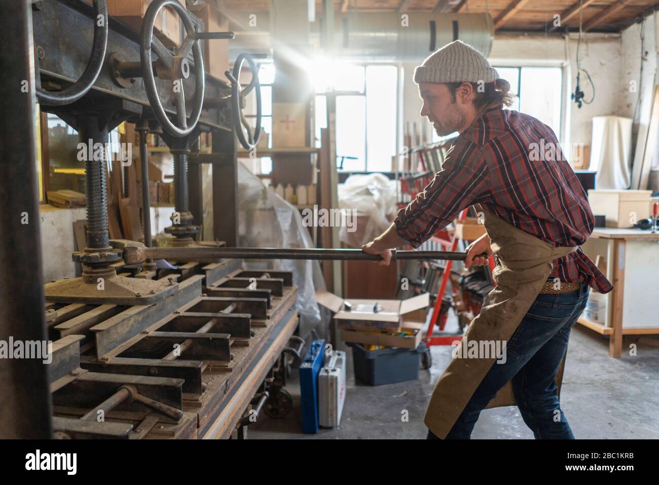 Craftsman at work in his workshop Stock Photo - Alamy