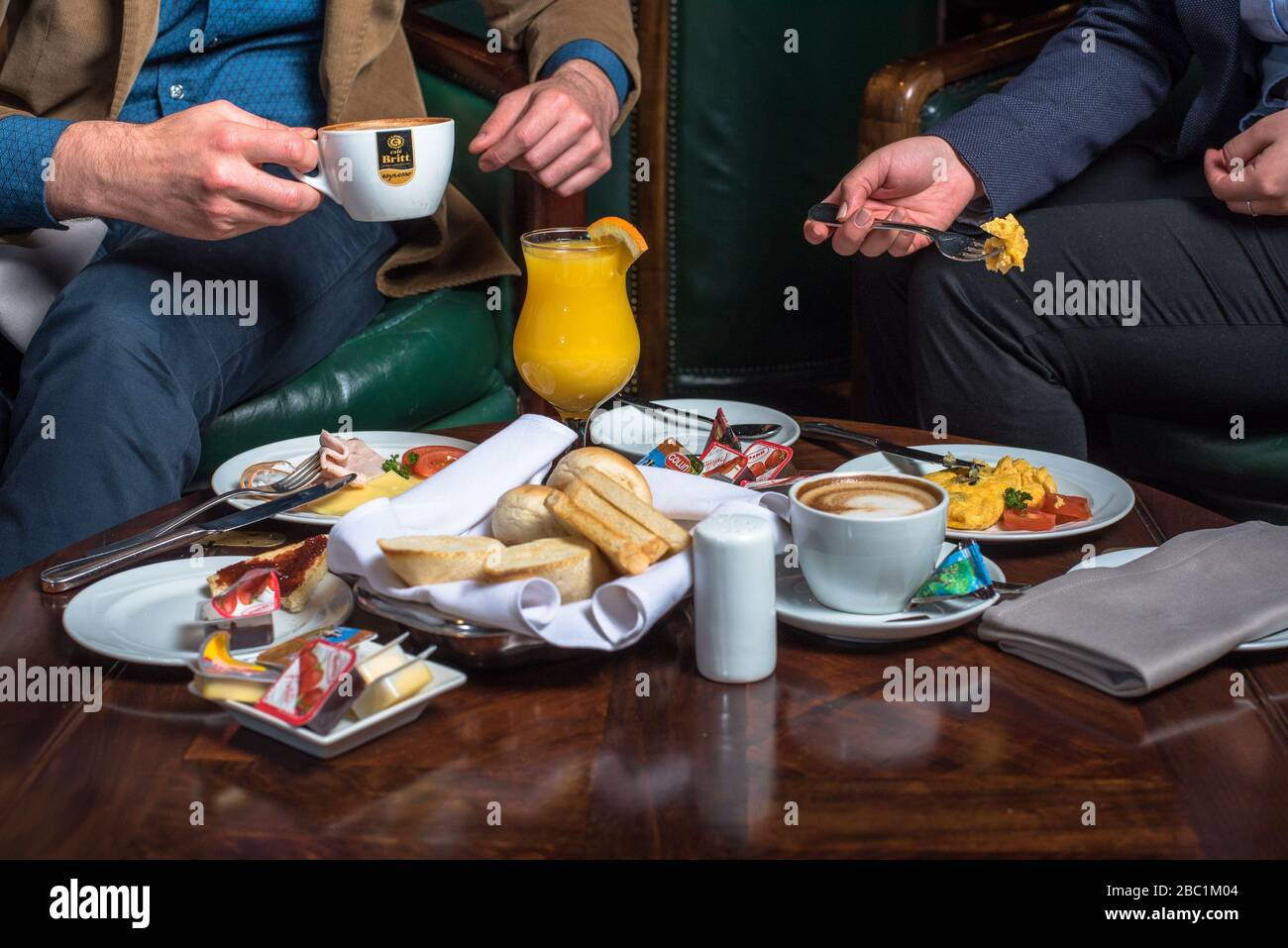 Table served with breakfast for two with different foods Stock Photo ...