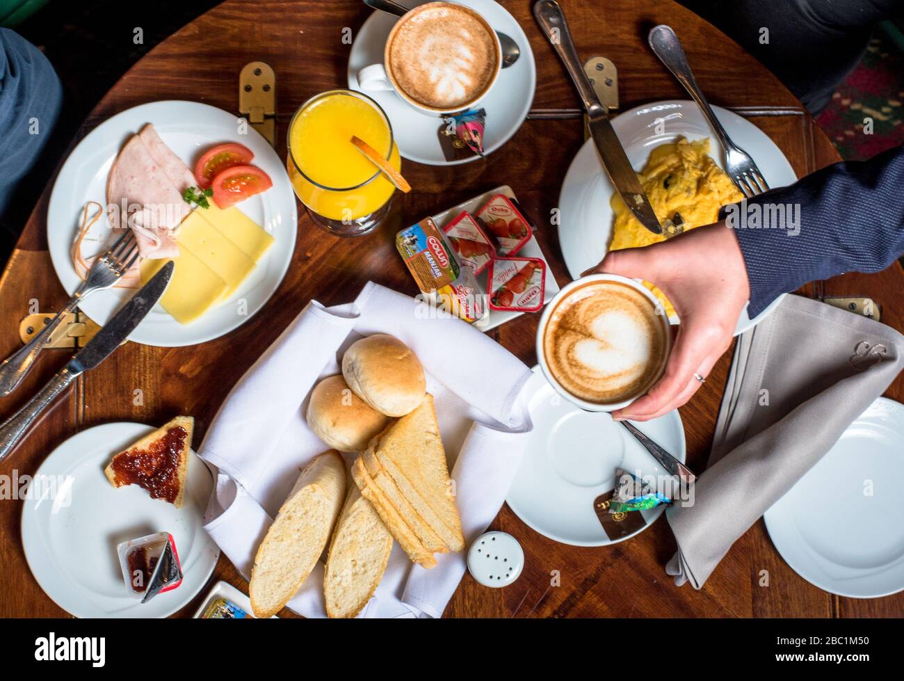 Table served with breakfast for two with different foods Stock Photo ...