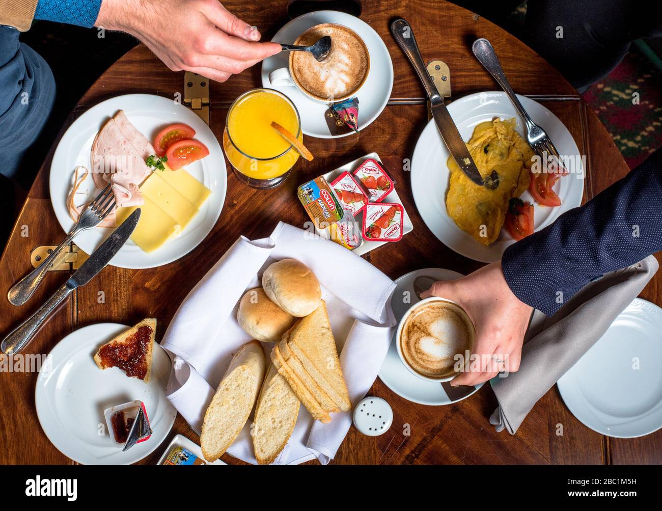 Table served with breakfast for two with different foods Stock Photo ...