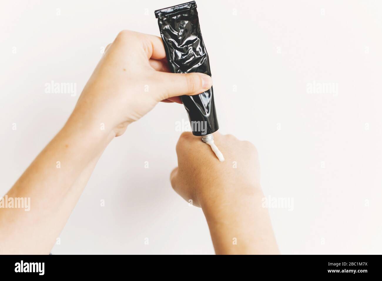 Applying gel hand during skin hi-res stock photography and images - Alamy