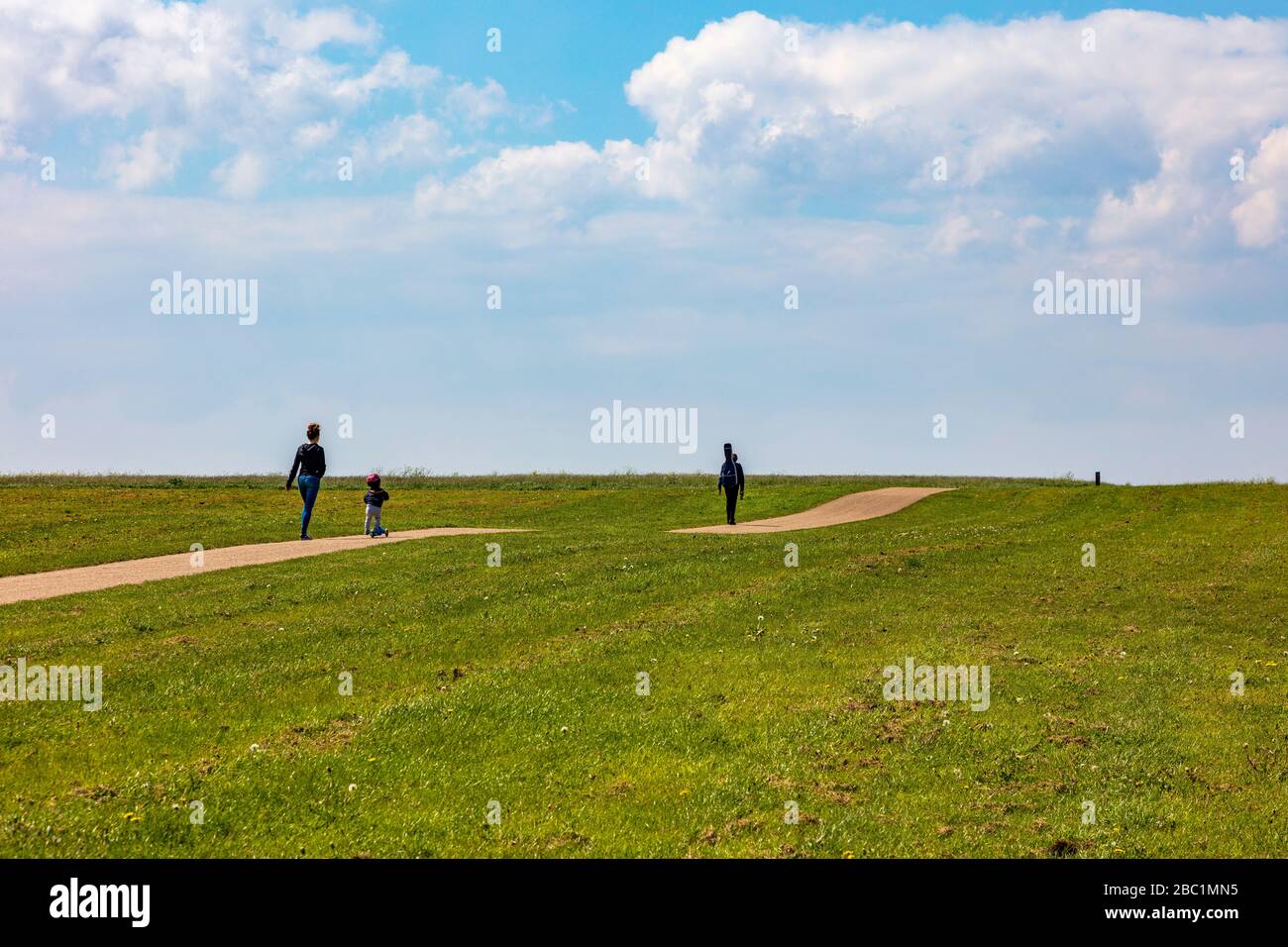 Mother with smalll child on scooter on the Great Lines Heritage Park ...