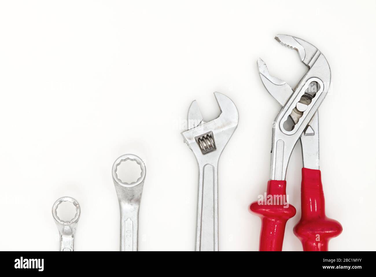 Wrench tools on white background. Technical tooling concept Stock Photo ...