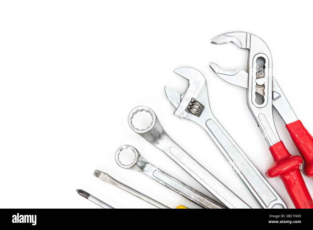 Wrench and screwdriver tools on white background. Technical tooling ...