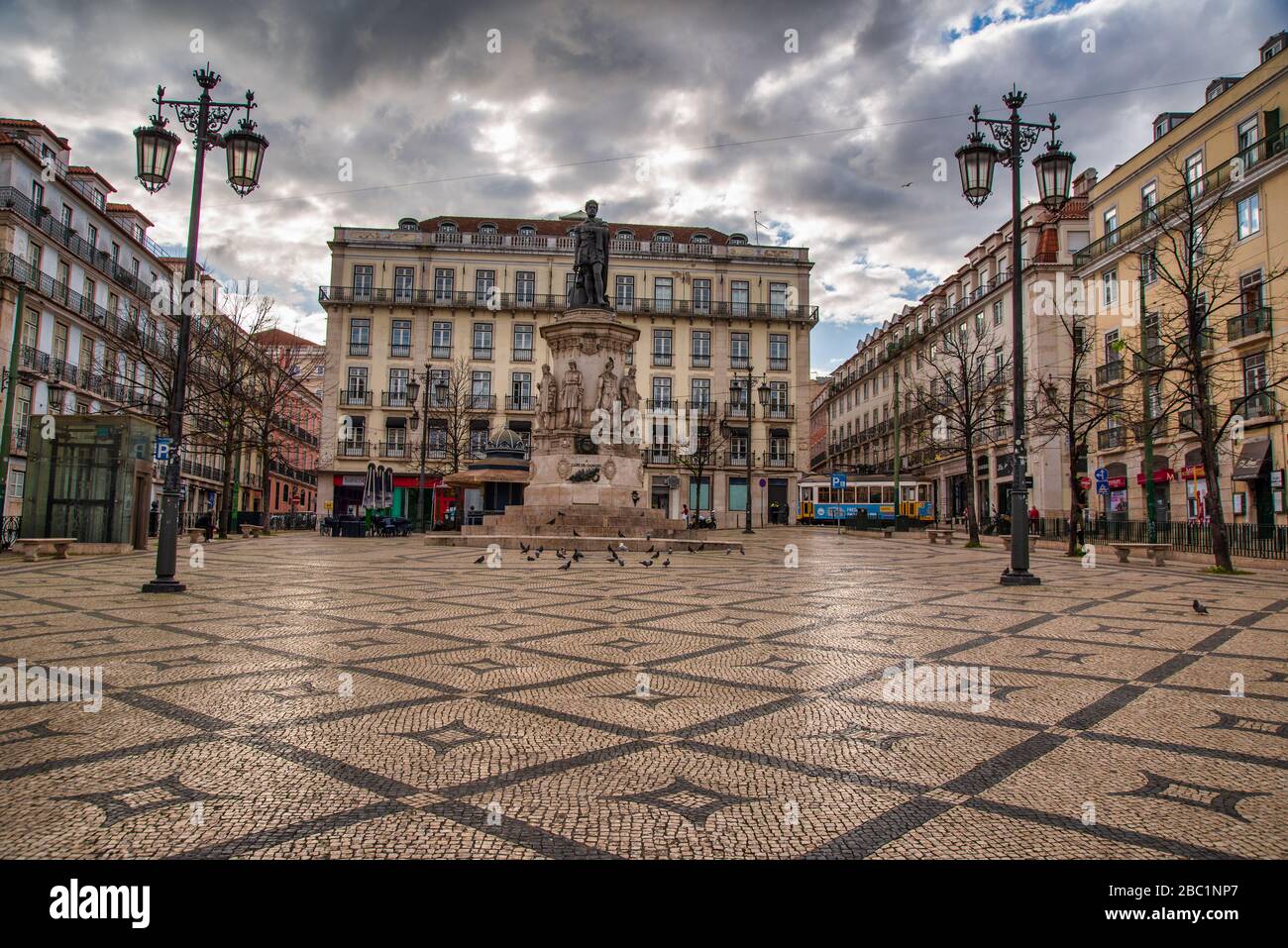 Historic Largo Luís de Camões square in Lisbon, Portugal, with cloudy ...